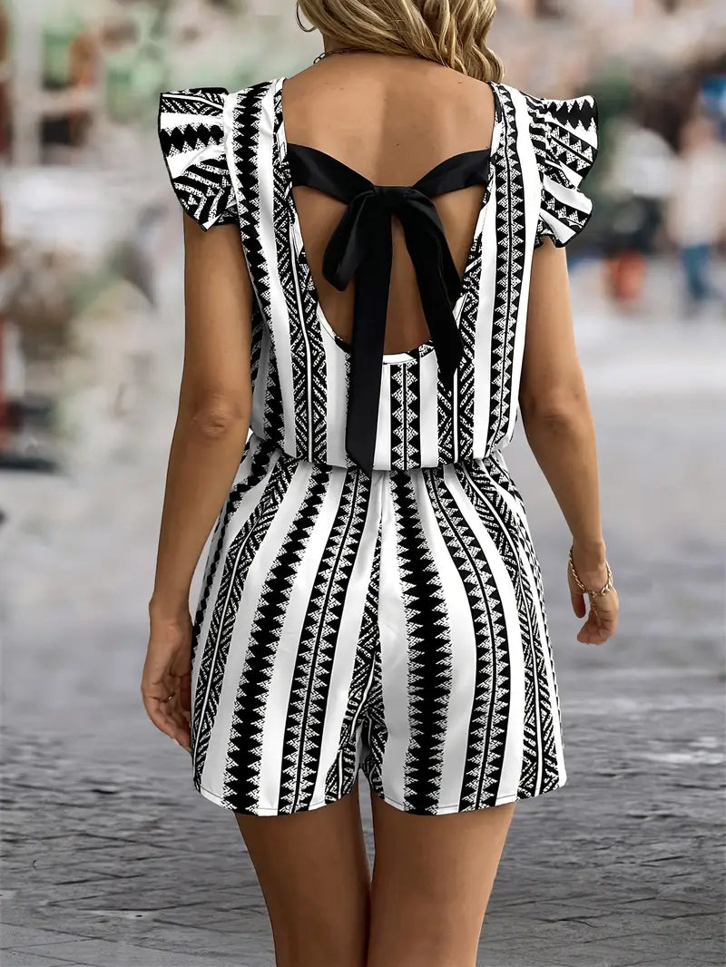 Millicent – Stylischer Strampler mit offenem Rücken – Juna Berlin